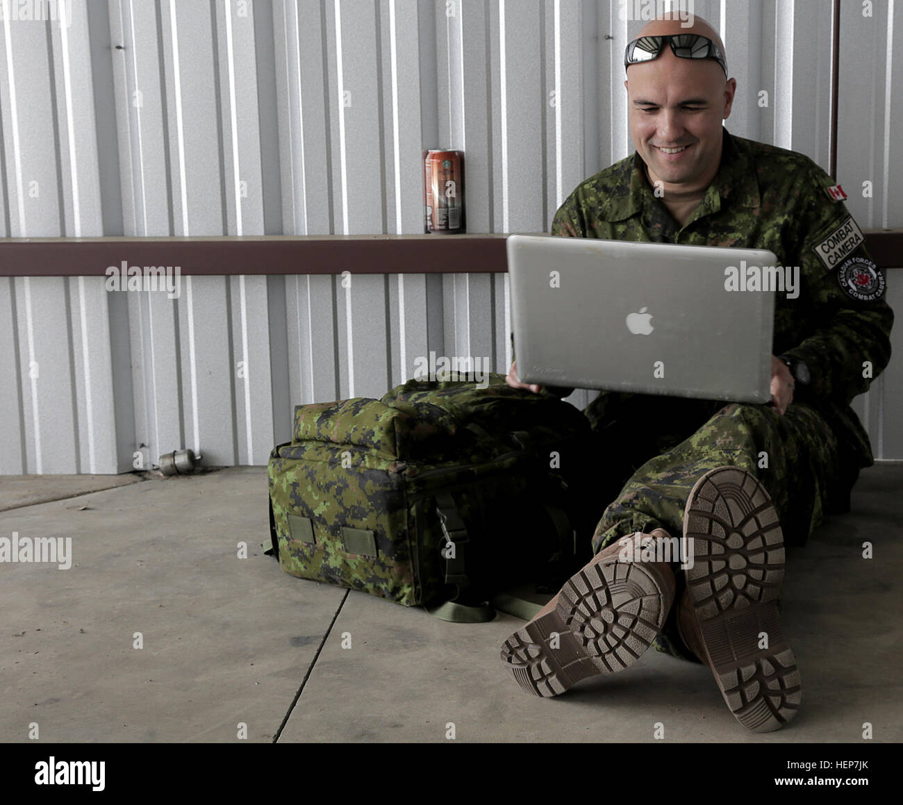 Canadian Sgt. Yannick Bedard, a member of the Canadian Combat Camera ...