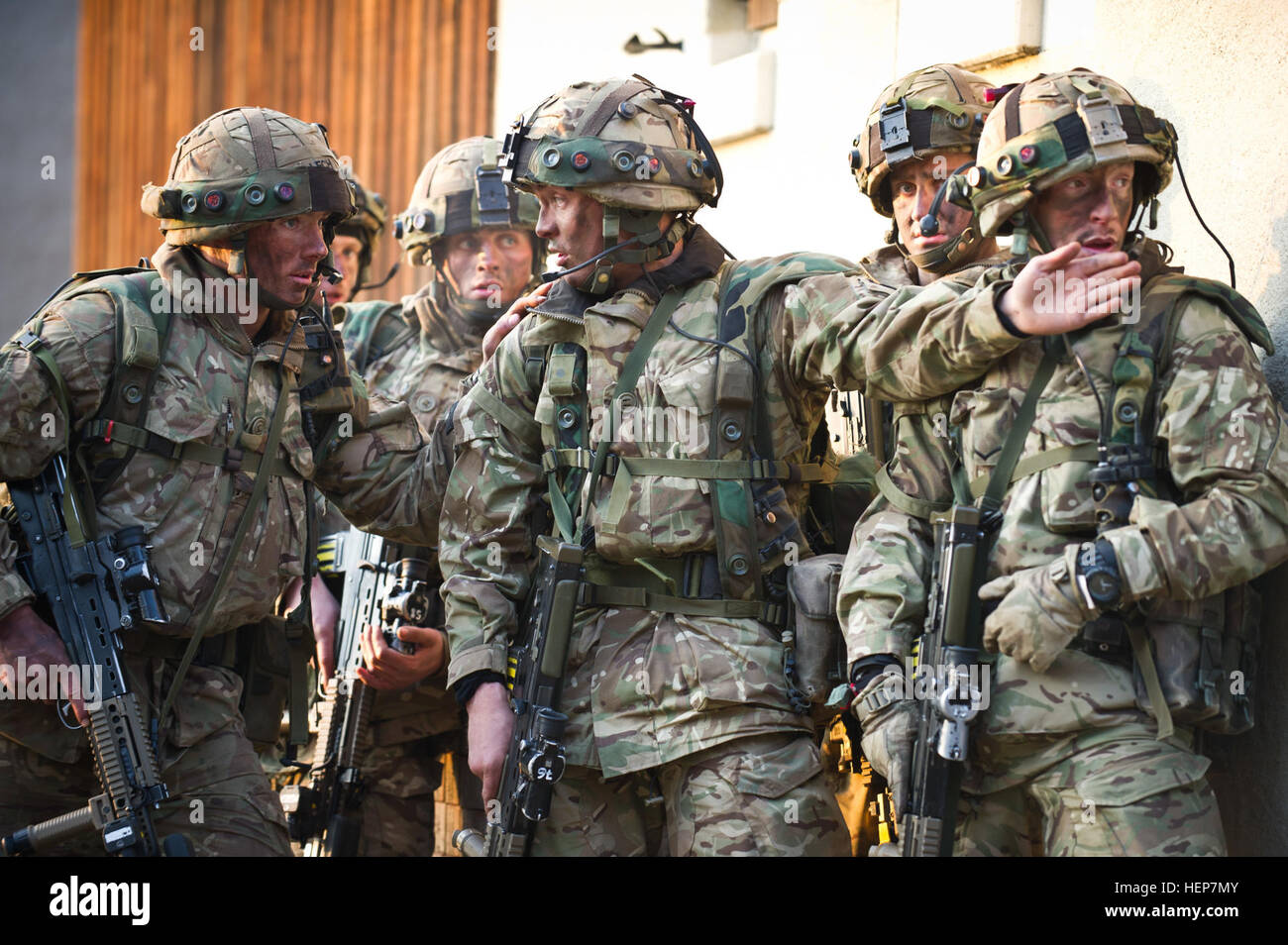 A British cadet of the Royal Military Academy Sandhurst gives ...