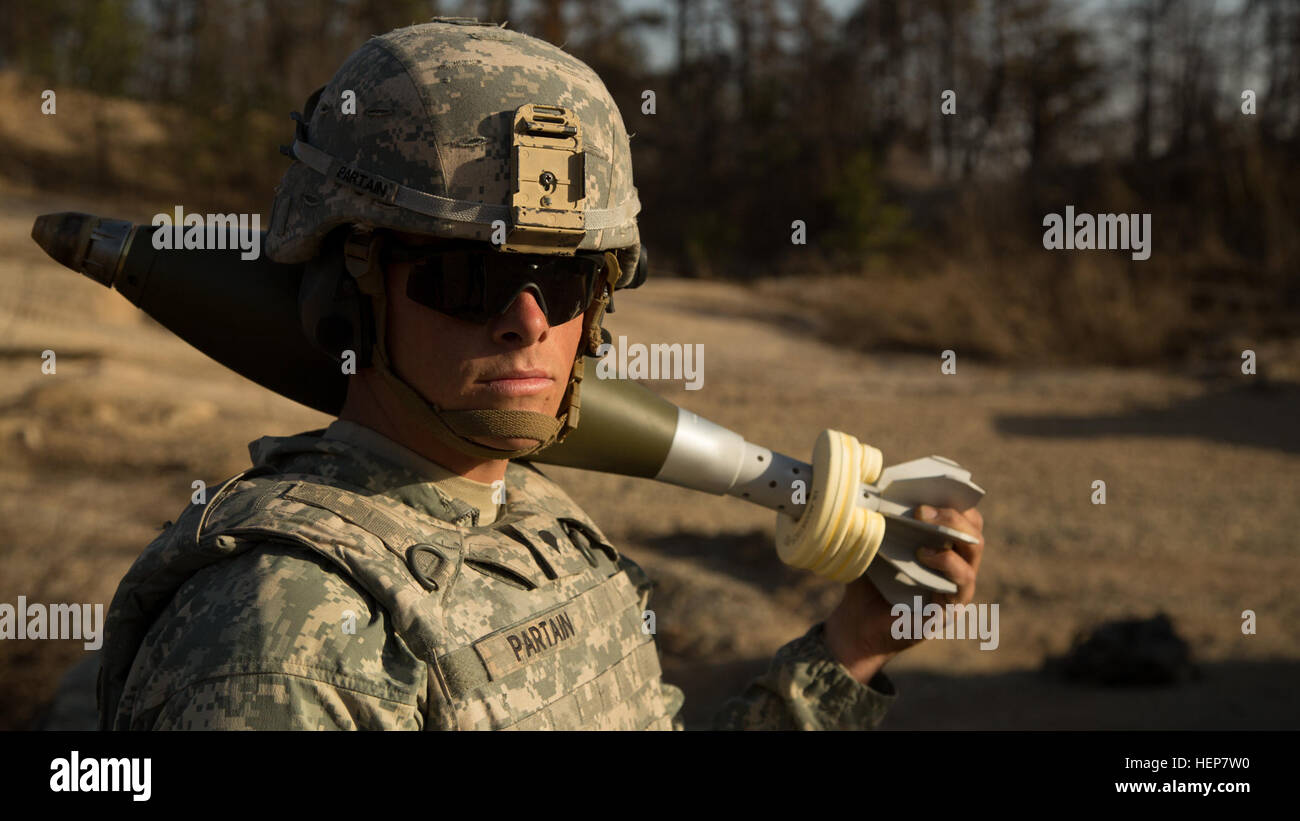 A U.S. Army soldier from the 2nd Stryker Brigade Combat Team prepares a ...