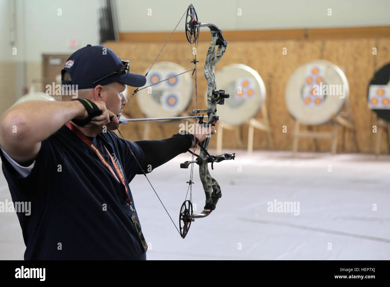 U.S. Army Staff Sgt. Corey Davis, Fort Leonard Wood, Missouri, aims ...