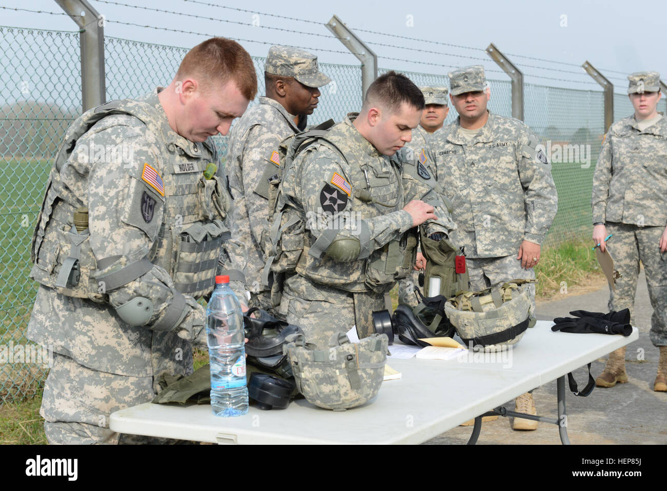 U.S. Soldiers, Staff Sgt. Ricky Holder and Sgt. Joe Primeau, assigned ...