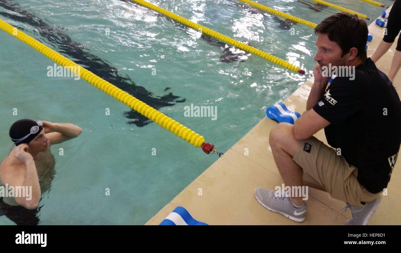 Jason Posey, an Army veteran, gets some lessons from coach Bobby Brewer ...