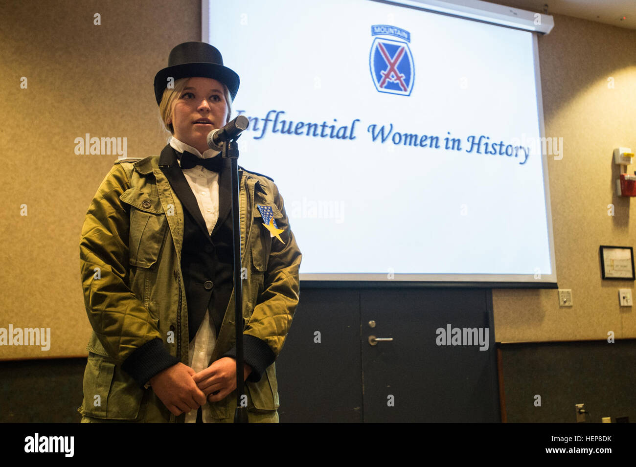 A U.S. Army military police officer portrays Dr. Mary E. Walker ...