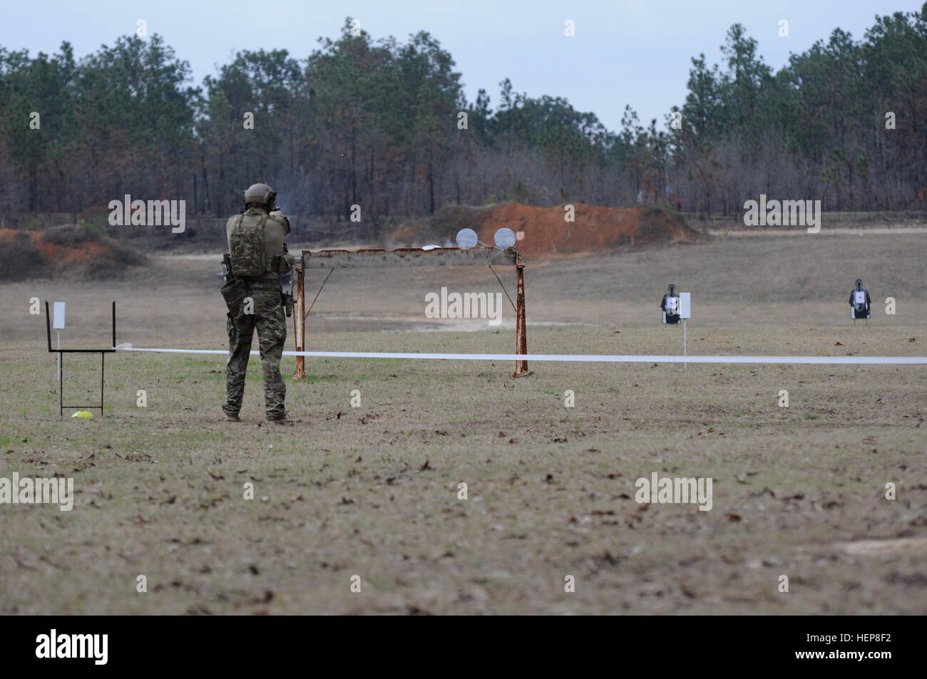 A member a Sniper Team fires at targets during the United States Army ...