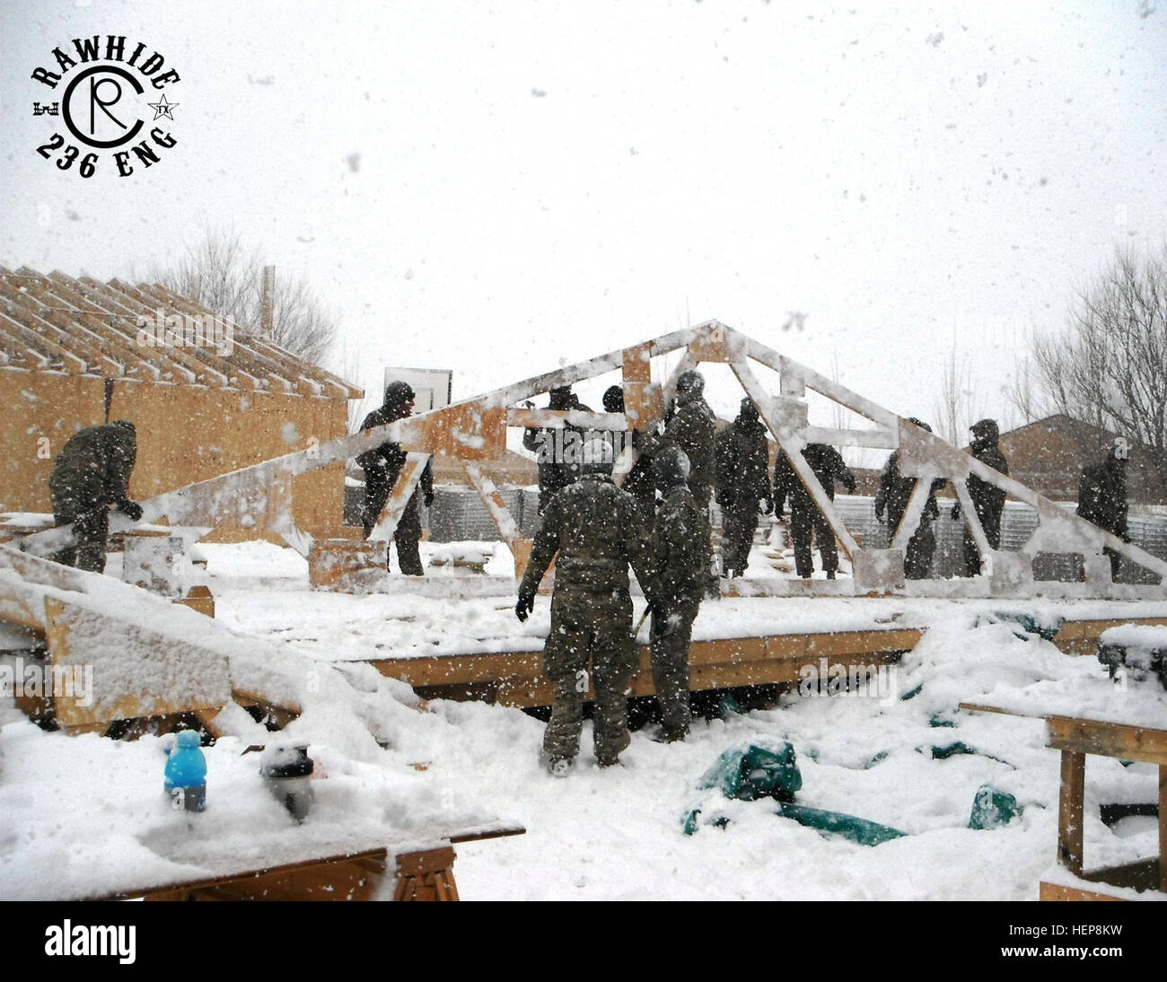 Soldiers from the 236th Vertical Construction Company construct trusses ...