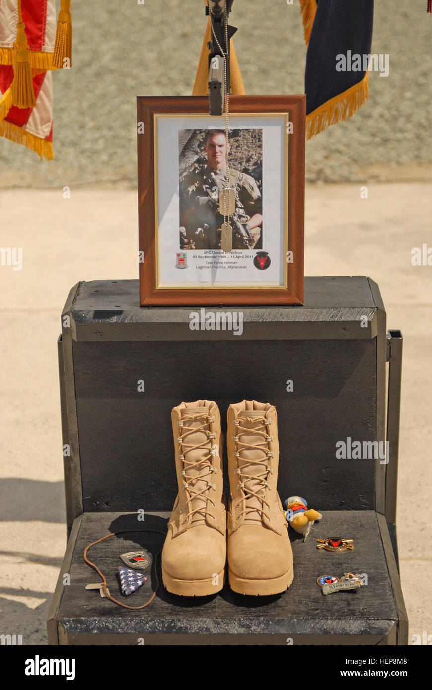 Soldiers pay respects through a memorial stand for Spc. Donald Lee ...