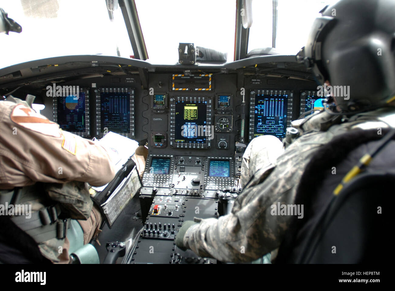 Midland, Mich., native Chief Warrant Officer 2 Christopher Henson (left ...