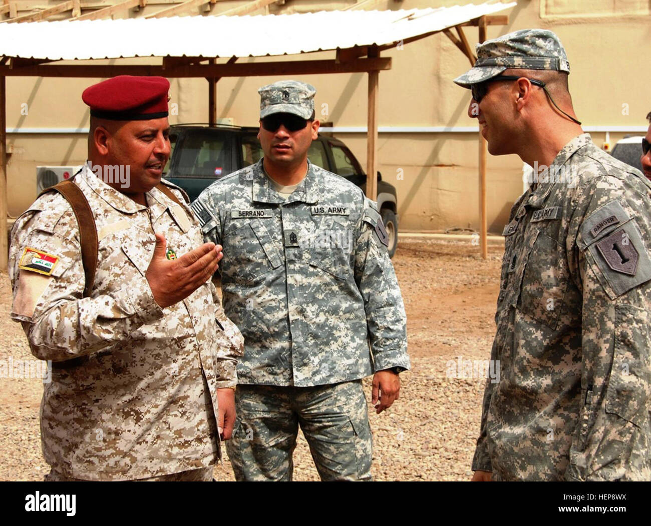 1st Sgt. Allen Serrano, center, first sergeant of B Company, center ...