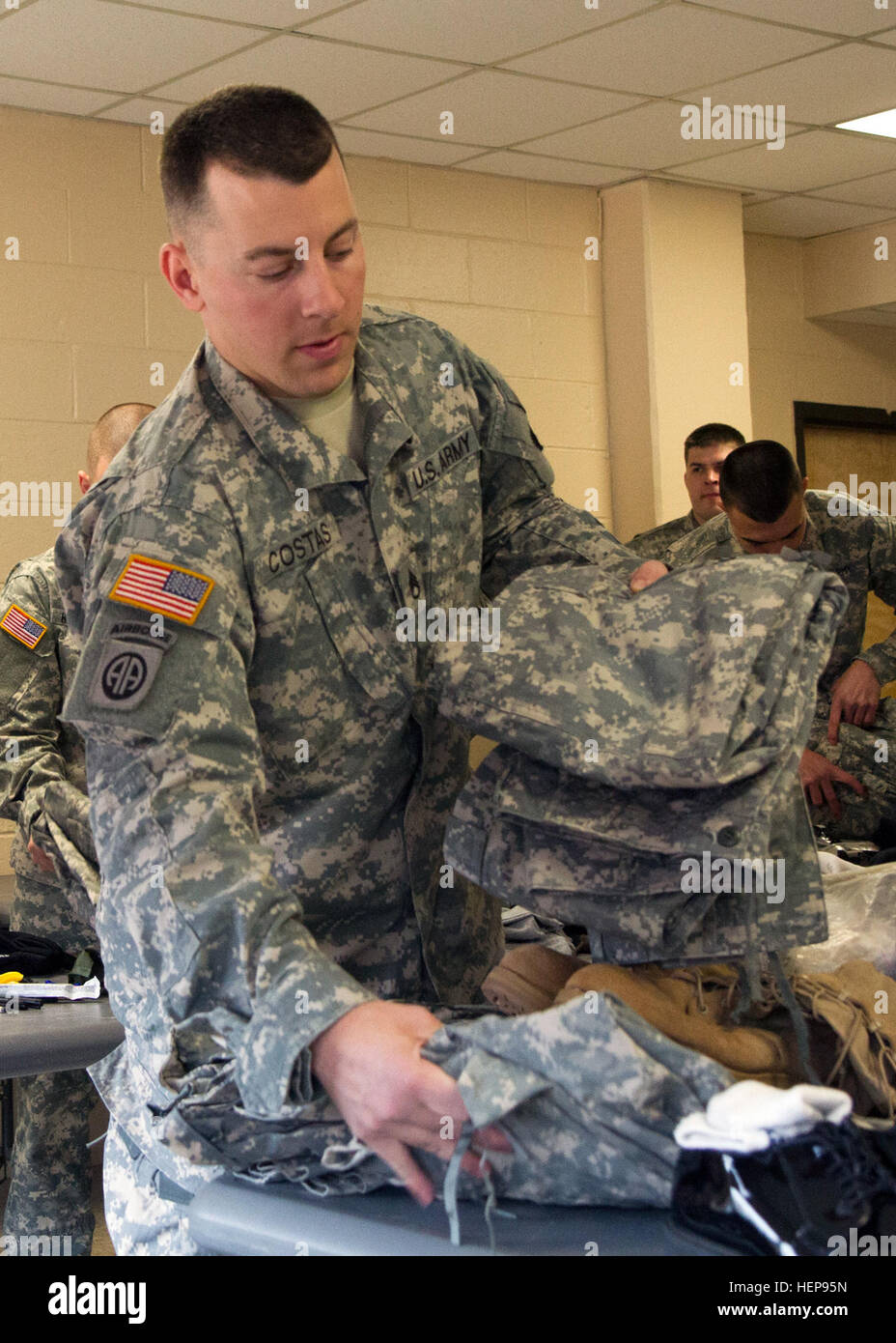 Staff Sgt. Jacob Costas, 28, a Military Police Soldier, inventories his ...
