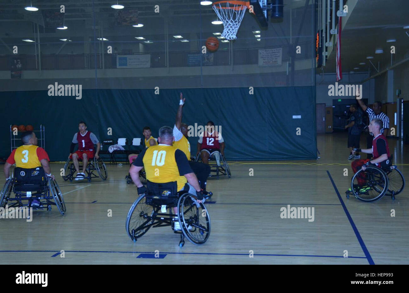 In wheelchair basketball, the Red Team, coached by Bill Demby, defeated ...