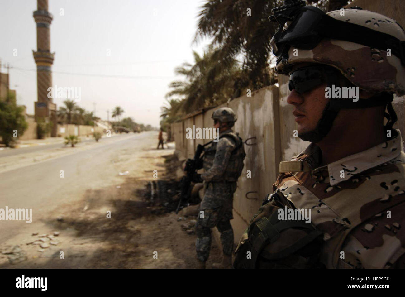 An Iraqi army soldier pulls security during a joint patrol with Multi ...