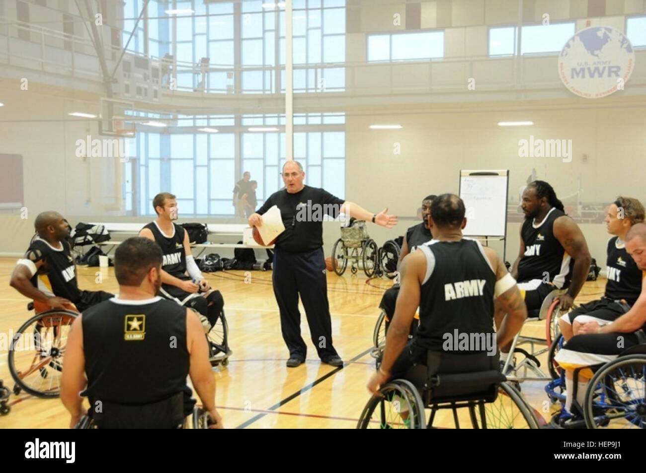 Fort Carson, Colo. - U.S. Army Wheelchair Basketball coach Doug Garner ...