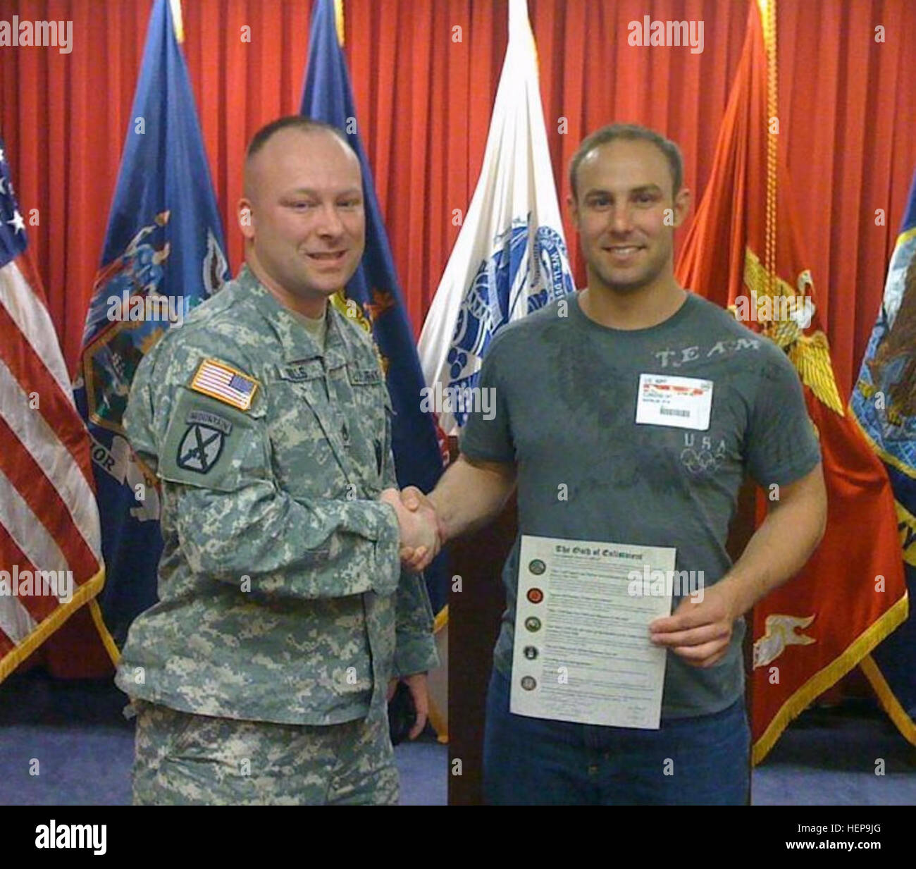 Staff Sgt. James Bills enlists bobsledder Nick Cunningham in to the New ...