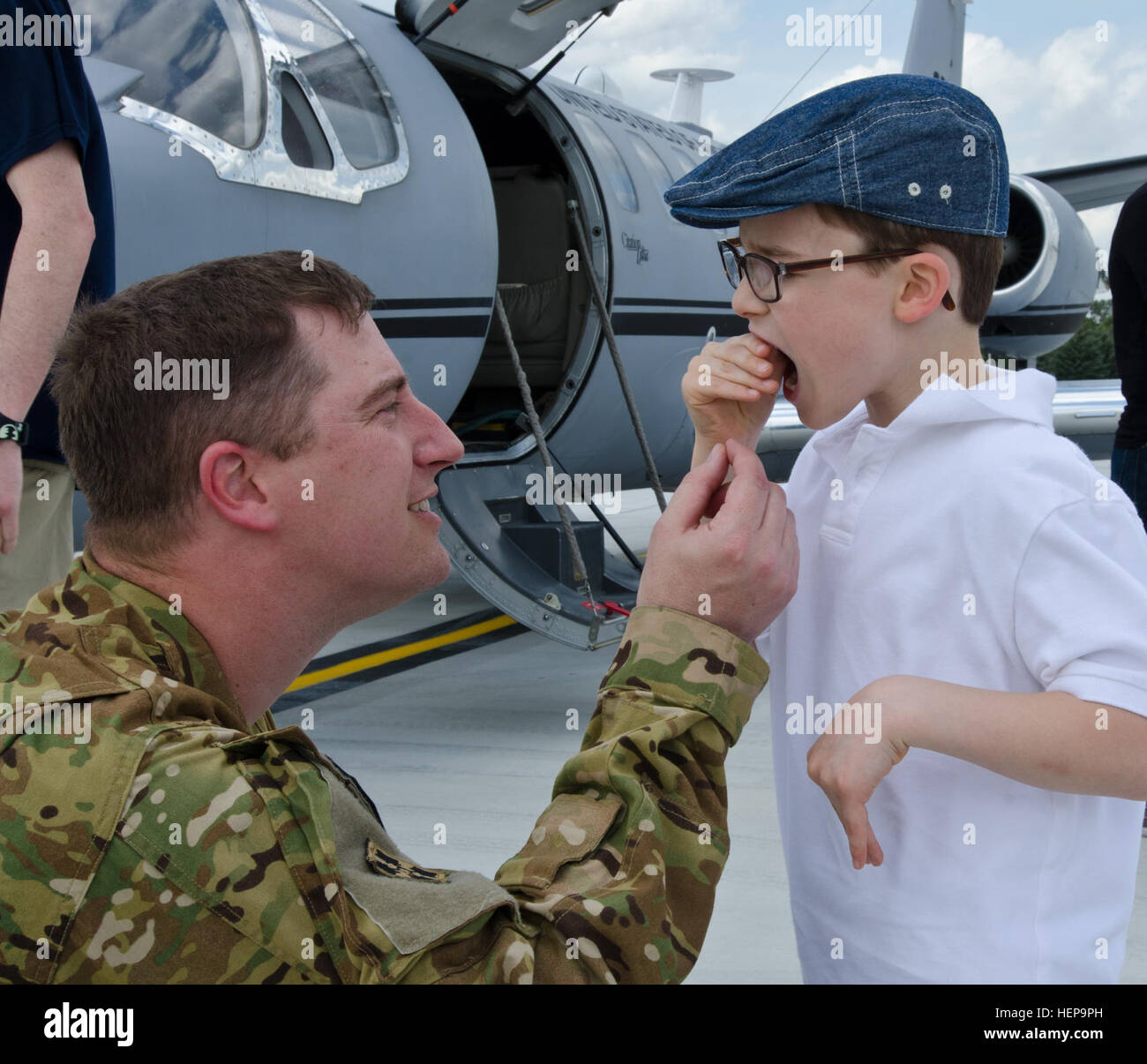 Chief Warrant Officer 4 Jason Boren kneels down to inspect the wiggly ...