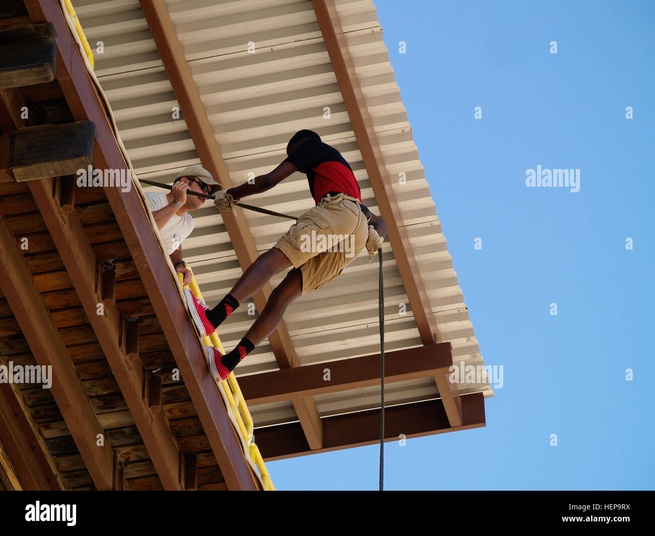 Participants complete a rappelling training exercise at Fort Bliss ...