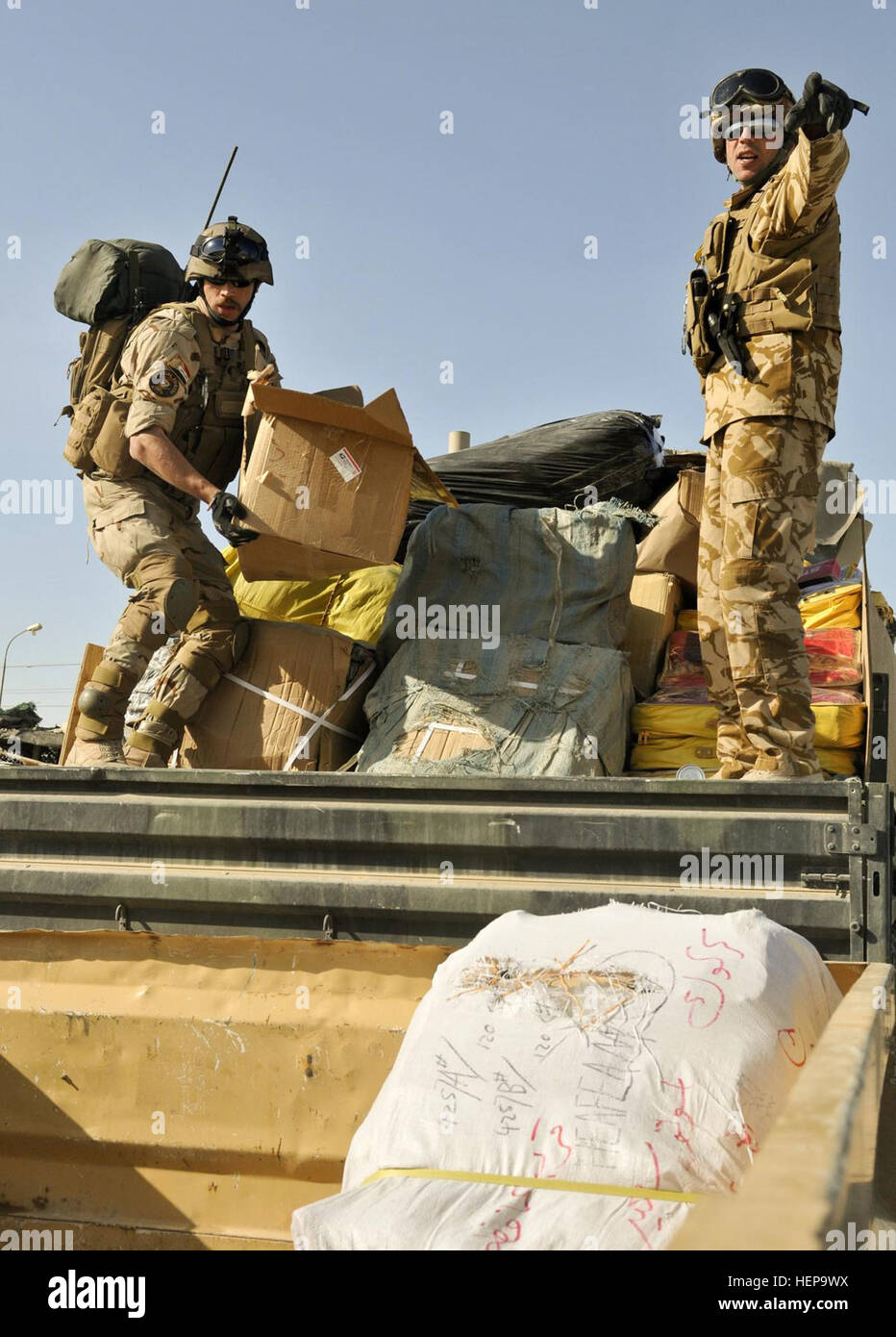 Two Iraqi jinood, Arabic for soldiers, assigned to 2nd Battalion, 48th ...