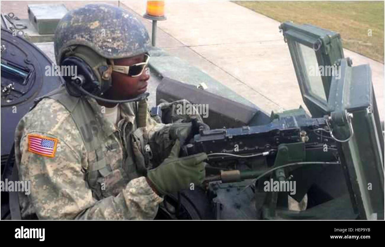 Pfc. Terrianna Martin handles the loader's M240 machine gun in Germany ...