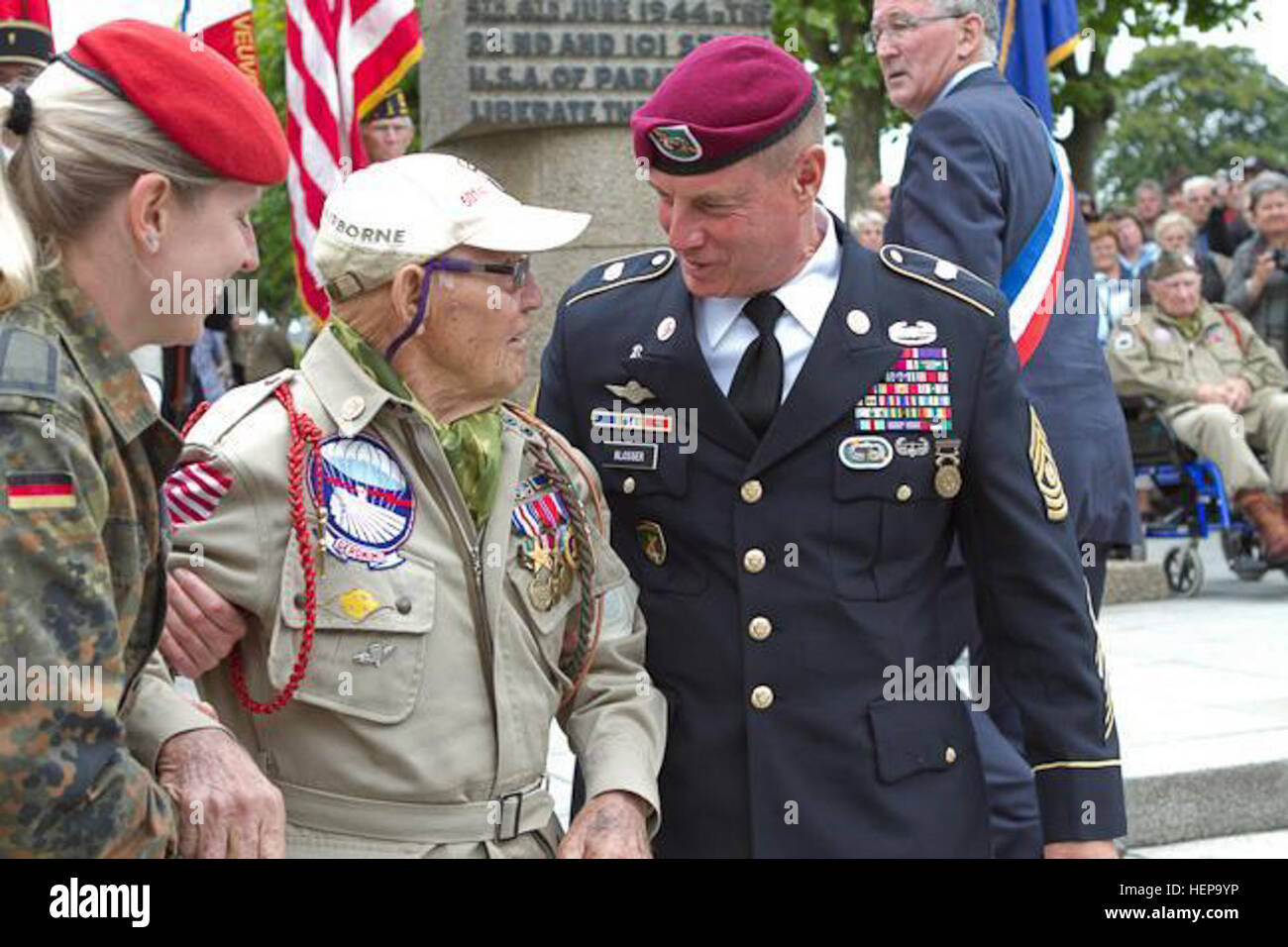 World War II veteran paratrooper and medic Robert Wright is assited to ...
