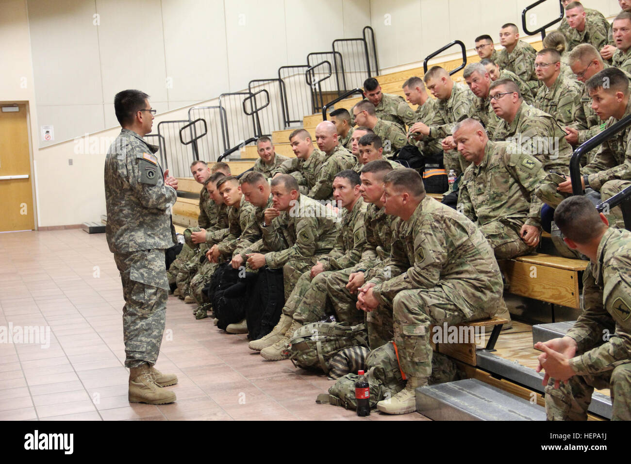 Master Sgt. Mike Gonzales, standing, noncommissioned officer in charge ...