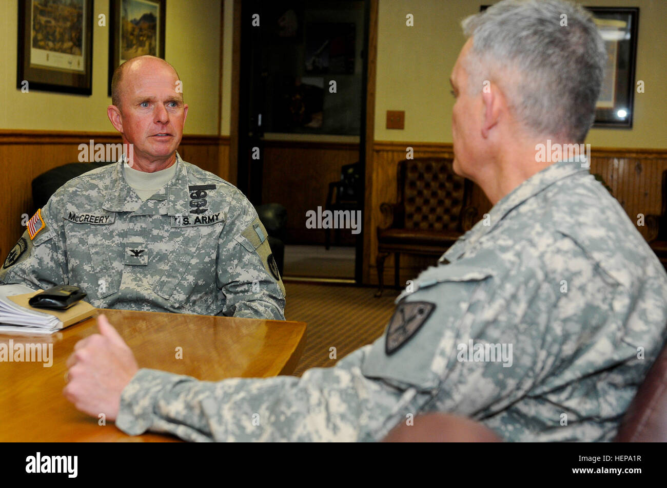 Col. Roger McCreery (left), commander, Tooele Army Depot, meets with ...