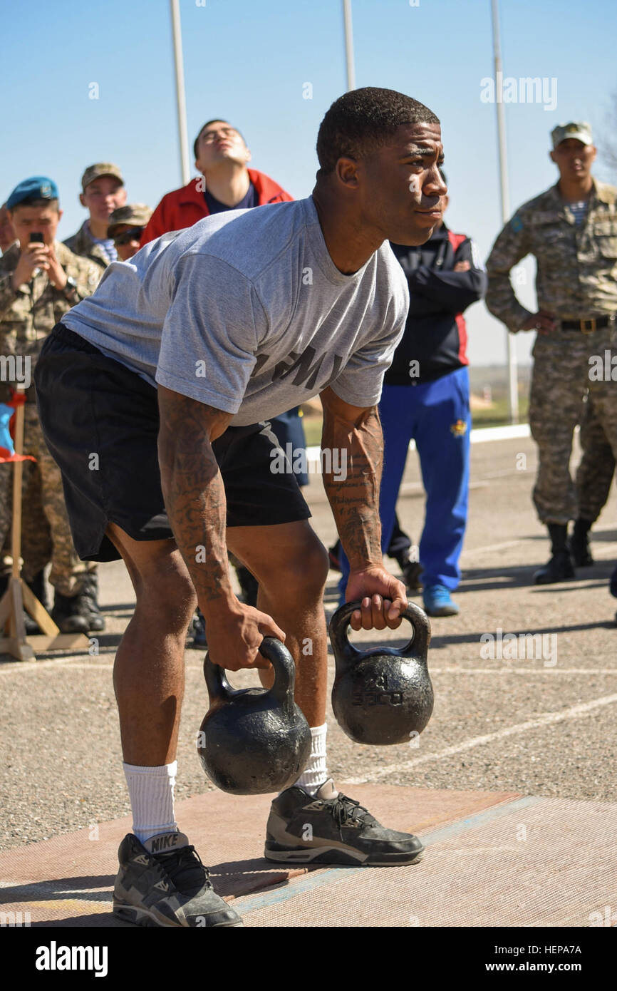 Columbus, Ga., native Staff Sgt. Eric Truss begins kettle bell lifts ...