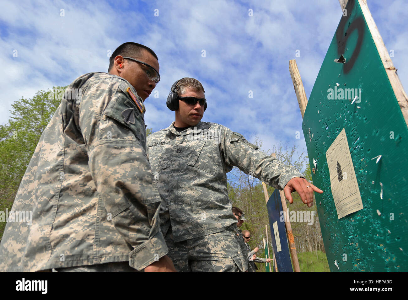 Staff Sgt. Rodney Cabebe (left), combat skills instructor for the ...