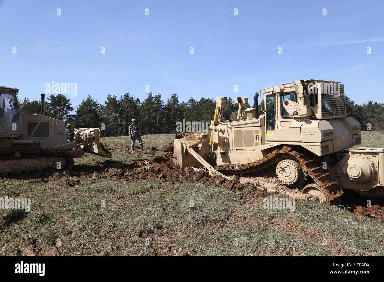 U.S. Soldiers of Regimental Engineer Squadron, 2nd Cavalry Regiment use ...