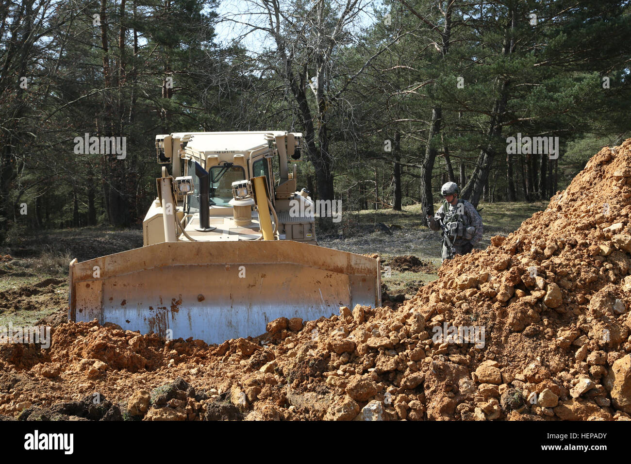 U.S. Soldiers of Regimental Engineer Squadron, 2nd Cavalry Regiment use ...