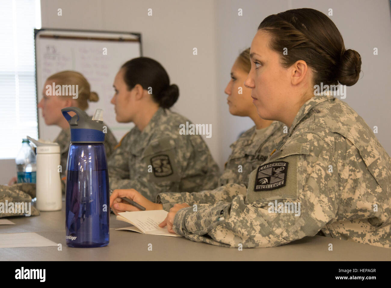 ROTC cadets from the University of Texas listen to a brief as they try ...