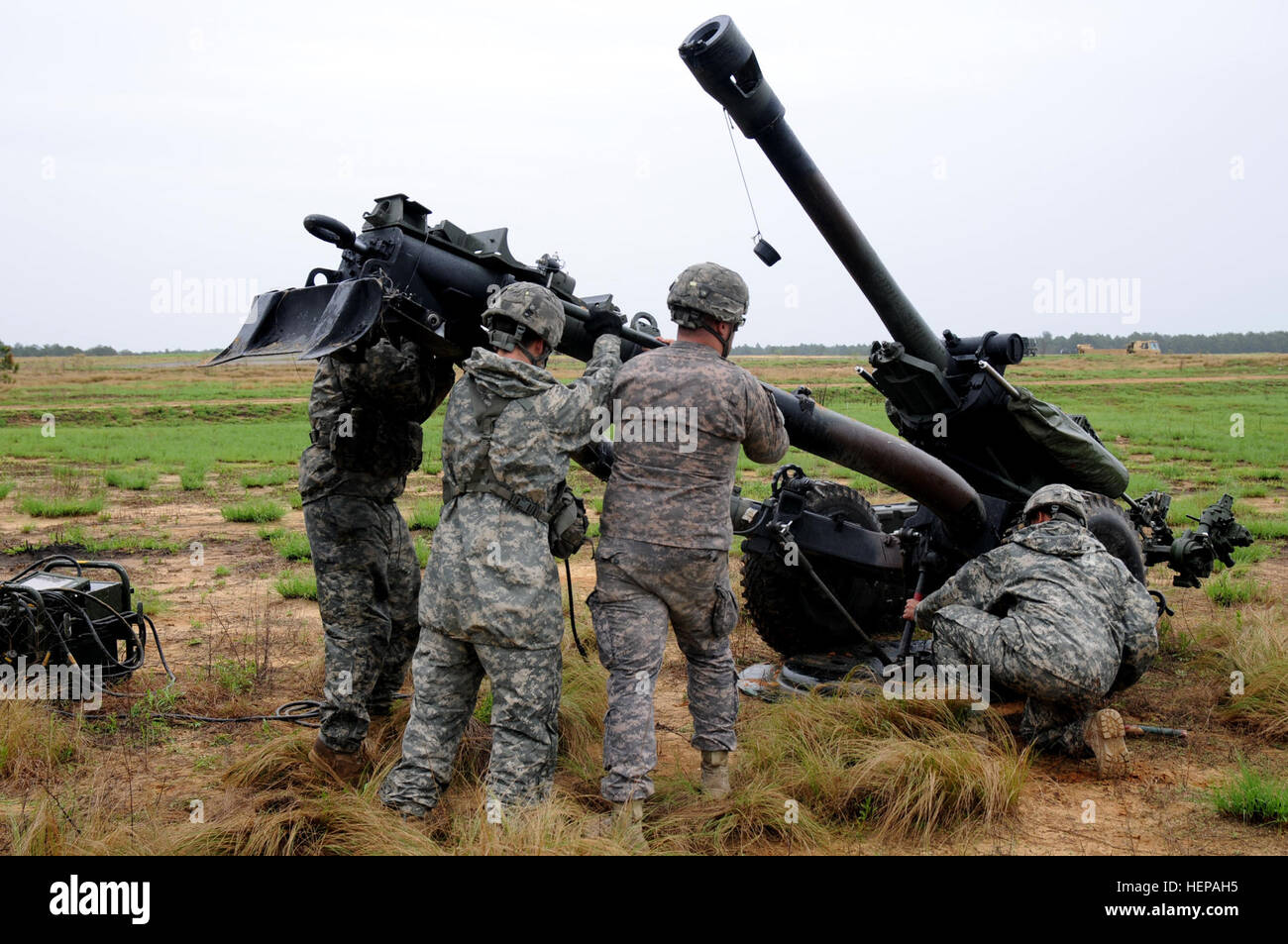 Paratroopers with 2nd Battalion, 319th Airborne Field Artillery Regiment, 82nd Airborne Division ...
