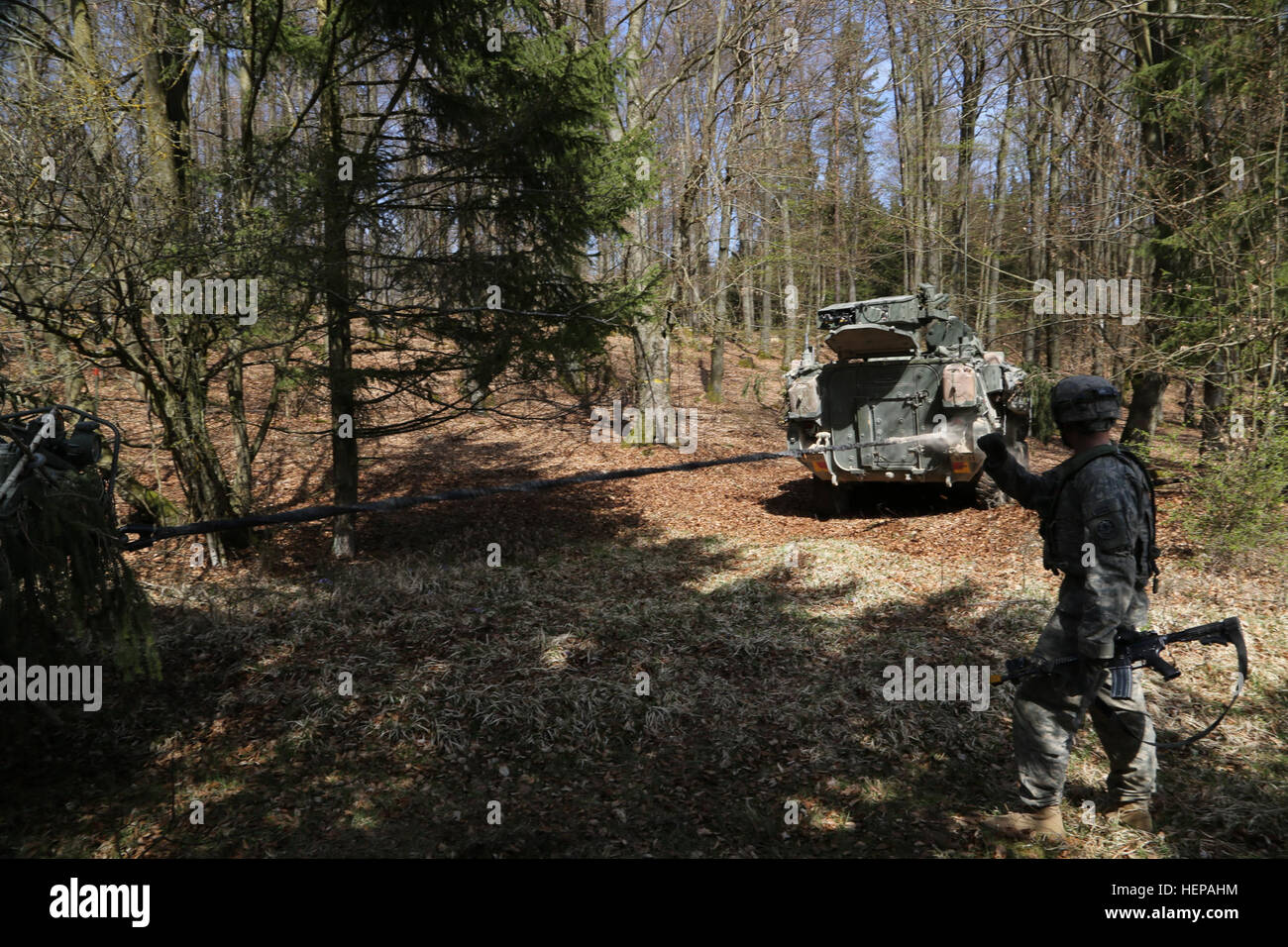 U.S. Soldiers of Reaper Troop, 4th Squadron, 2nd Cavalry Regiment tow ...