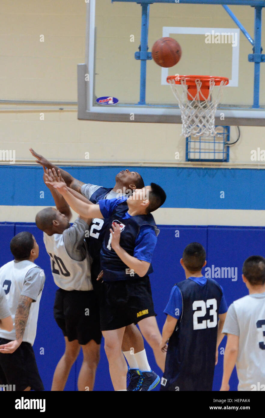 Soldiers battle under the glass for a rebound during from Warrior ...