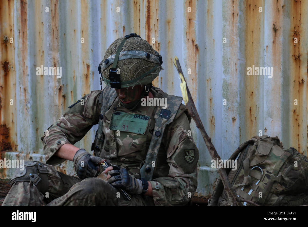 A British paratrooper with the United Kingdom's 16 Air Assault Brigade ...