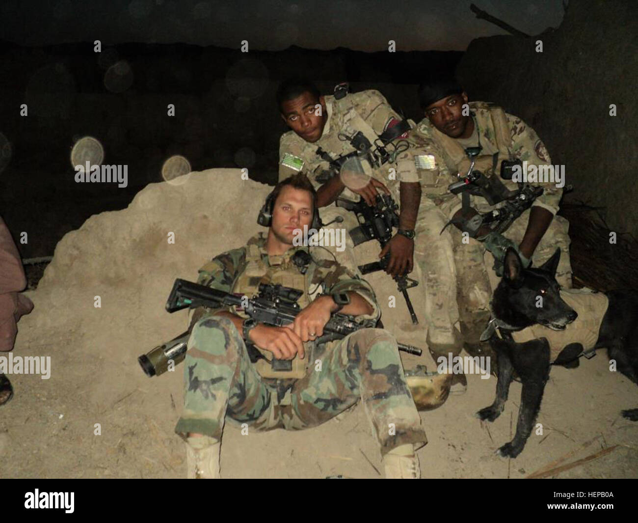 Sgt. James Bethea of Washington, right, assigned to 550th MWD Det ...