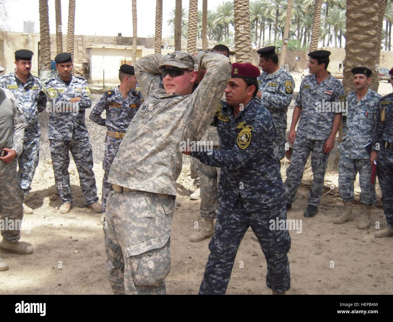 A police officer with the1st Mechanized Brigade, 4th Iraqi Federal ...