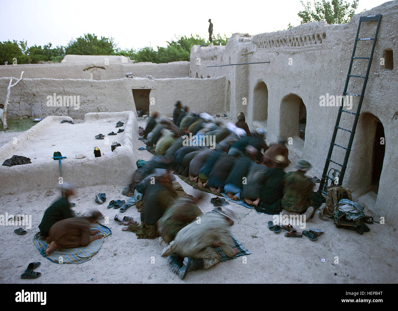 Afghan villagers, joined by Afghan commandos with the Afghan National ...