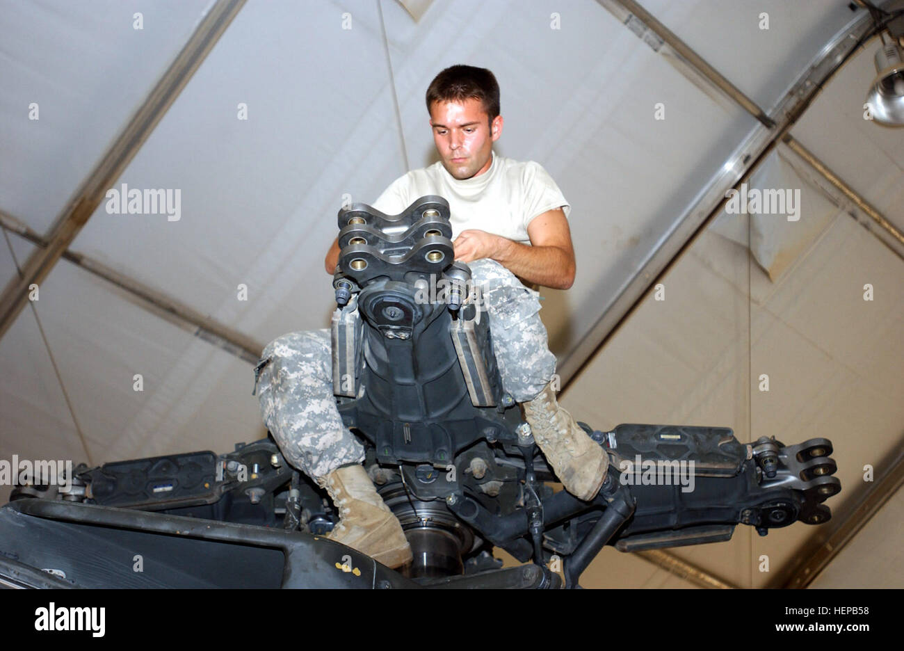 CAMP TAJI, Iraq – Cpl. Christopher Spencer, Apache helicopter mechanic ...