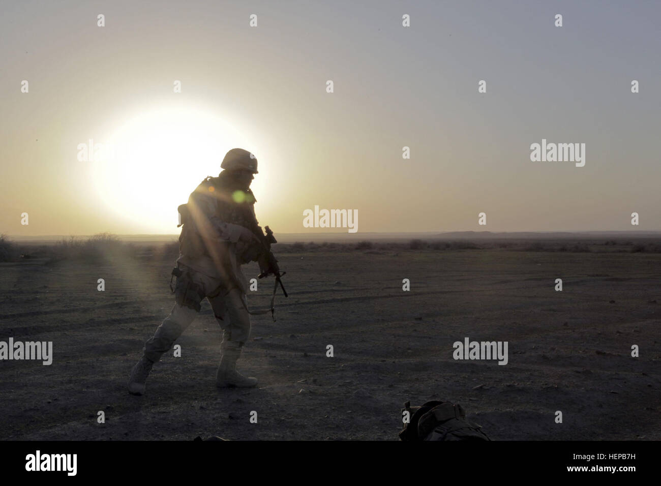 A U.S. Navy Seabee with Naval Mobile Construction Battalion 26, departs ...