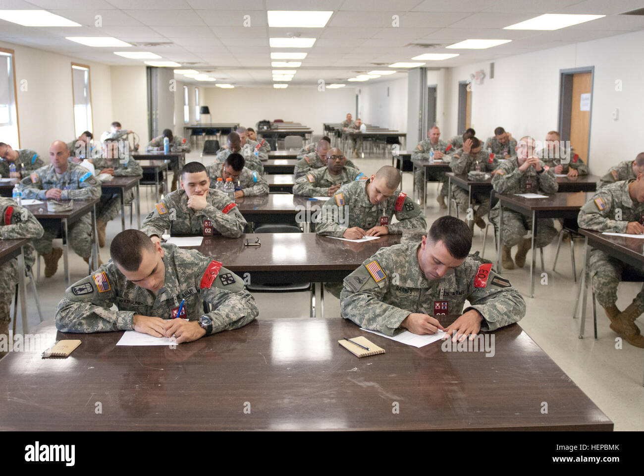 Soldiers take the written test as part of the 412th and 416th Theater ...