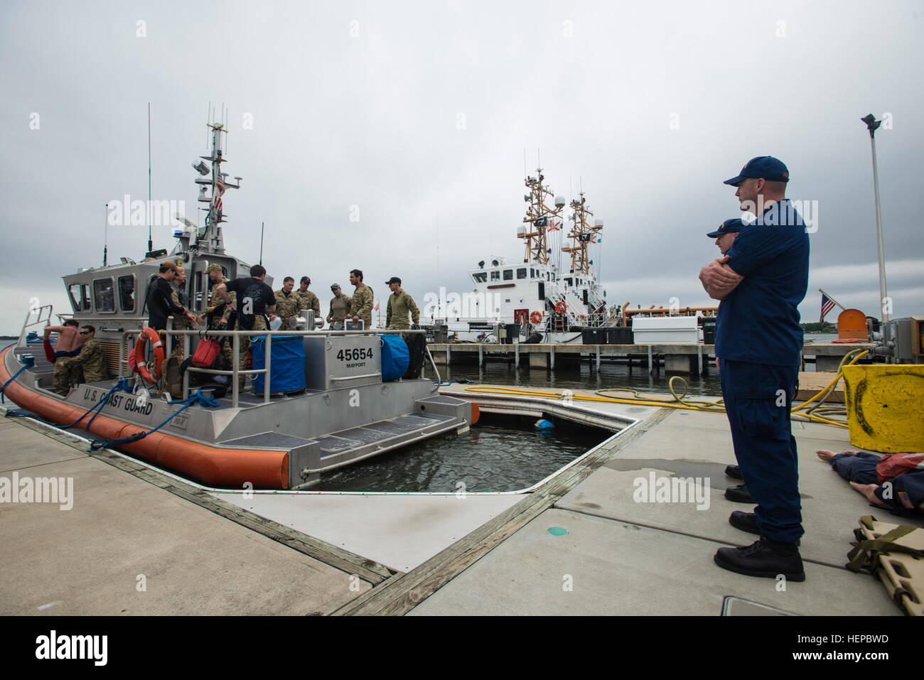 Chief Warrant Officer Nicholas Pavlik and Petty Officer 1st Class Aaron ...