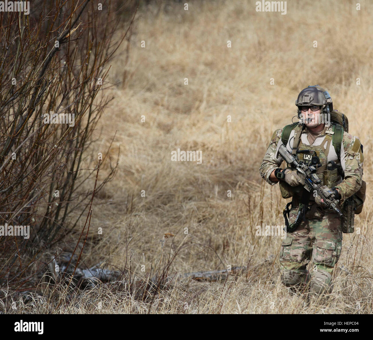 A pararescueman with 212th Rescue Squadron positions himself to cover a ...