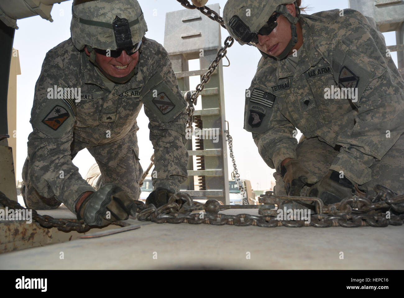 Sgt. Richard Hall, left and Spc. Regina Tetreault, assigned to 32nd ...