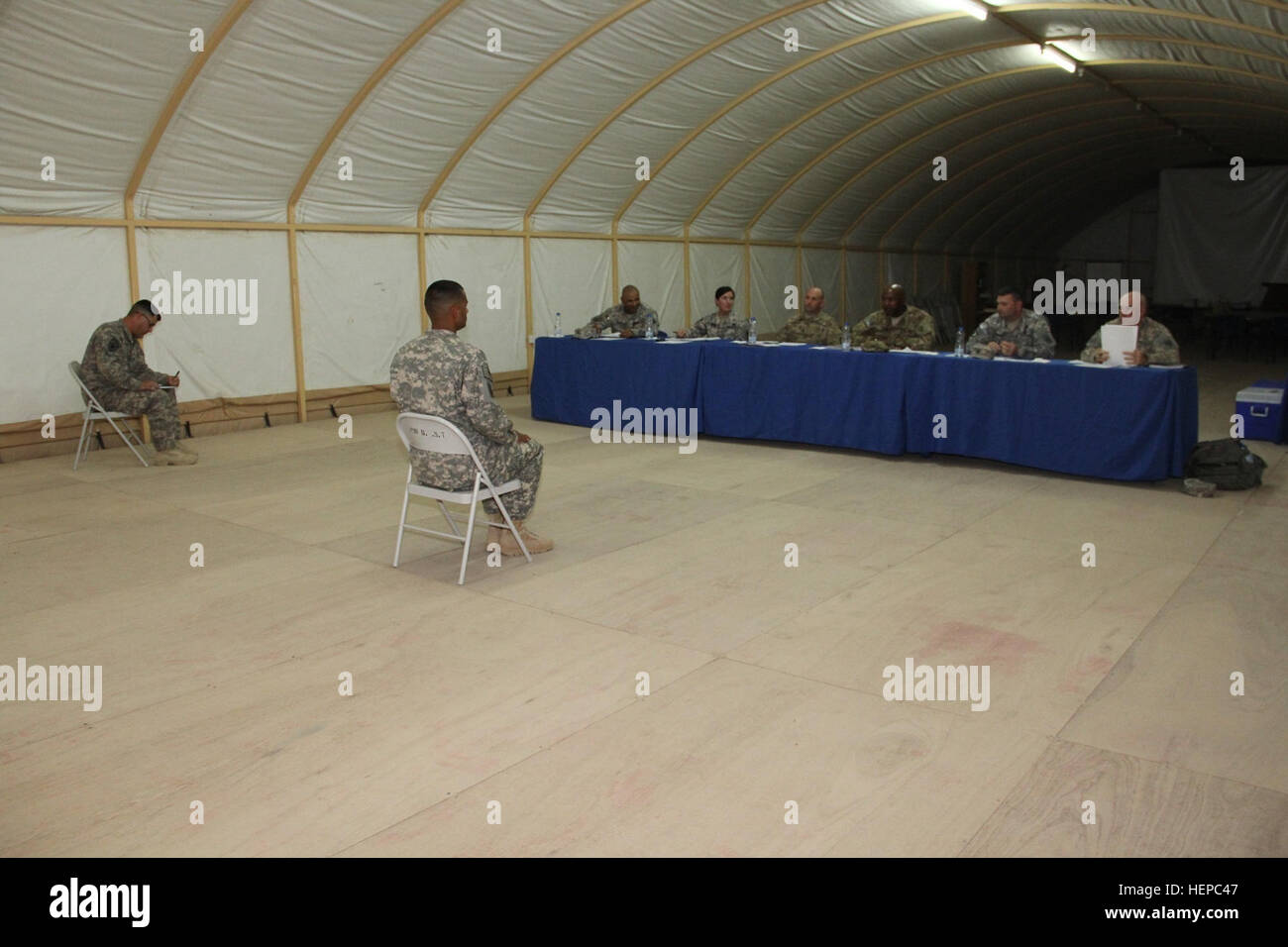 A noncommissioned officer sits before the six-member board as the final ...