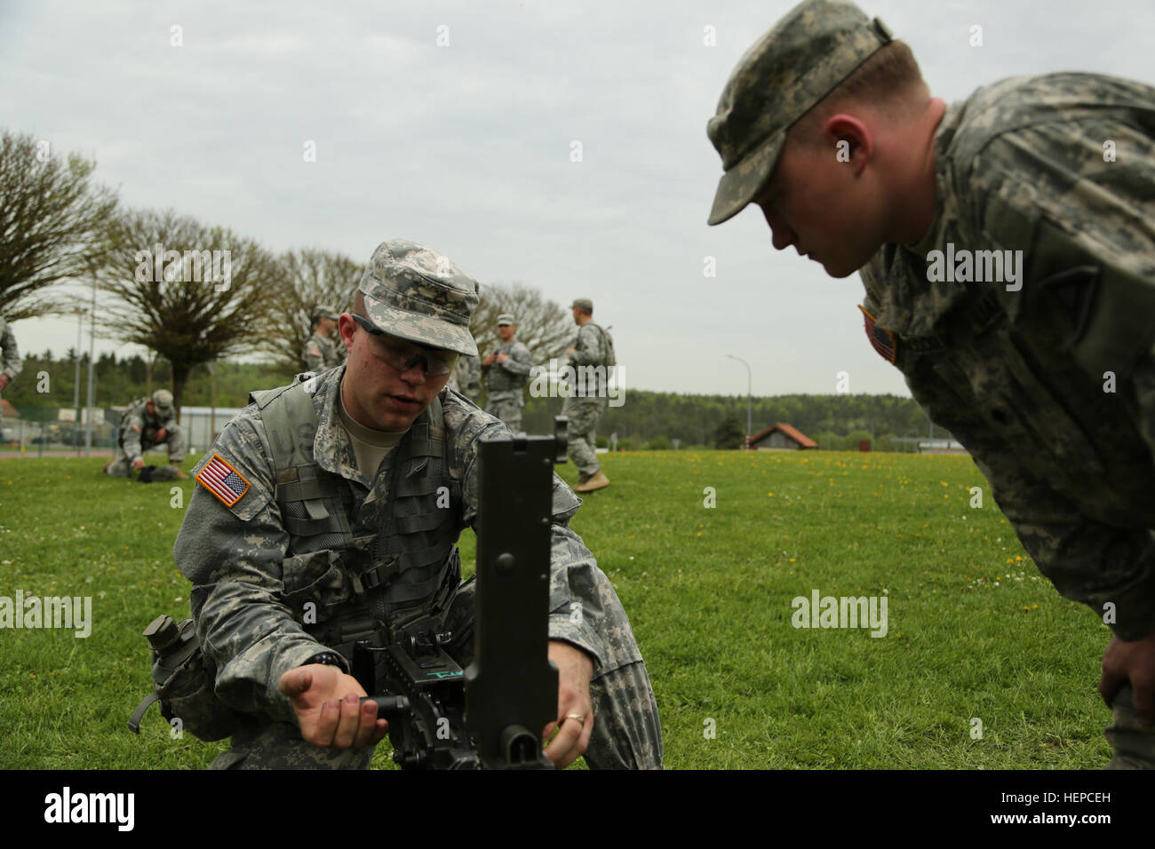 U.S. Army Spc. Paul Tusiak, right, of Charlie Company, 1st Battalion ...