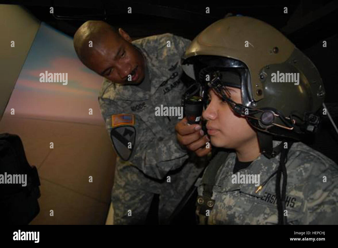 Chief Warrant 3 Officer Joe Goode (left), an AH-64D Apache attack ...