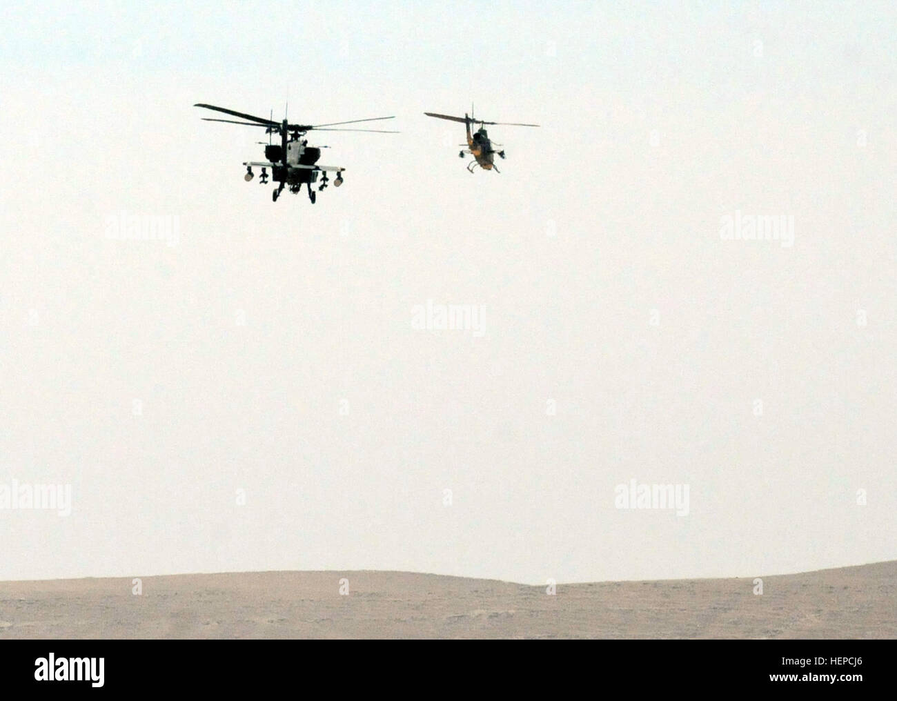An Ah-1 Cobra from 12th Squadron, Jordanian Air Force and an AH-64 ...