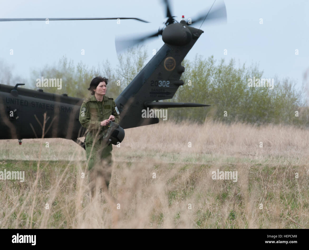 Canadian Cpl. Sandra Marcoux, a medic with the Canadian army, walks ...