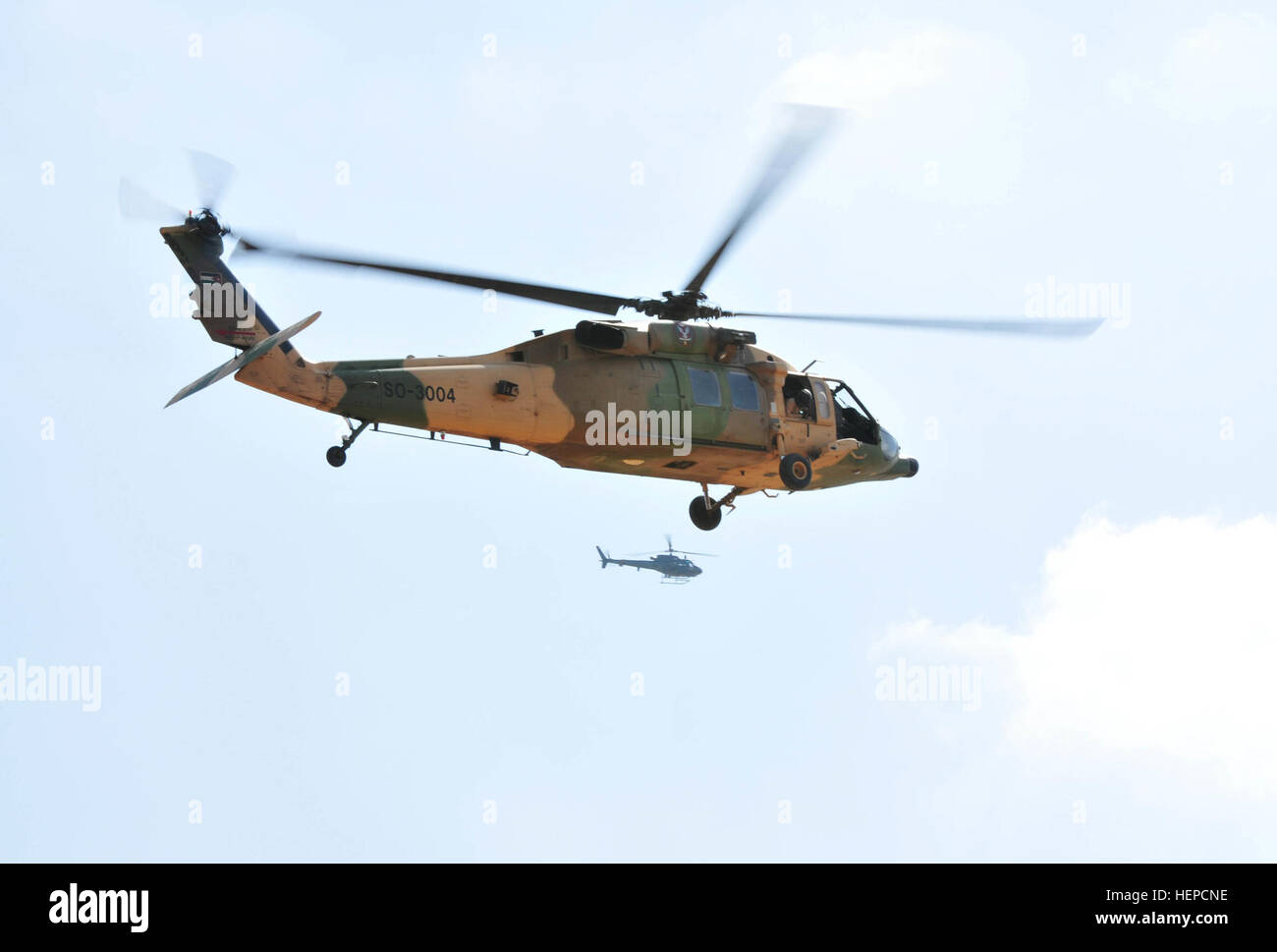 A Jordanian UH-60 Black Hawk helicopter descends toward its landing ...
