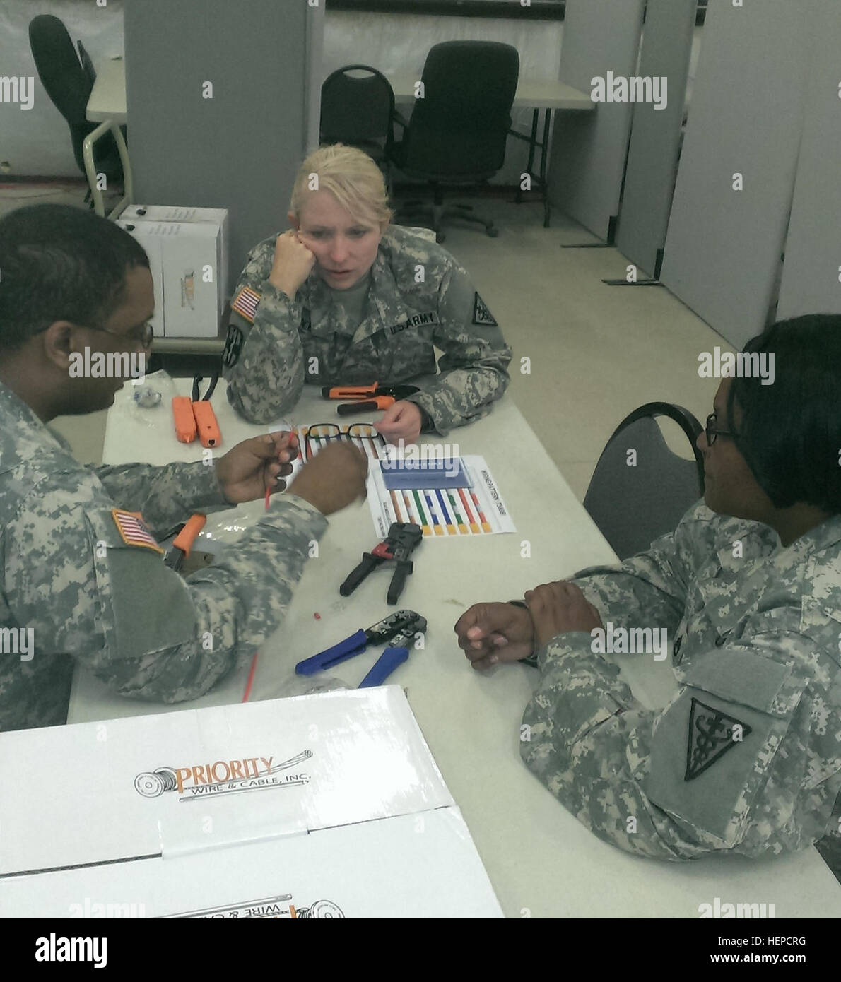 Spc. Jared Geraci, left, a signal support systems specialist for the ...