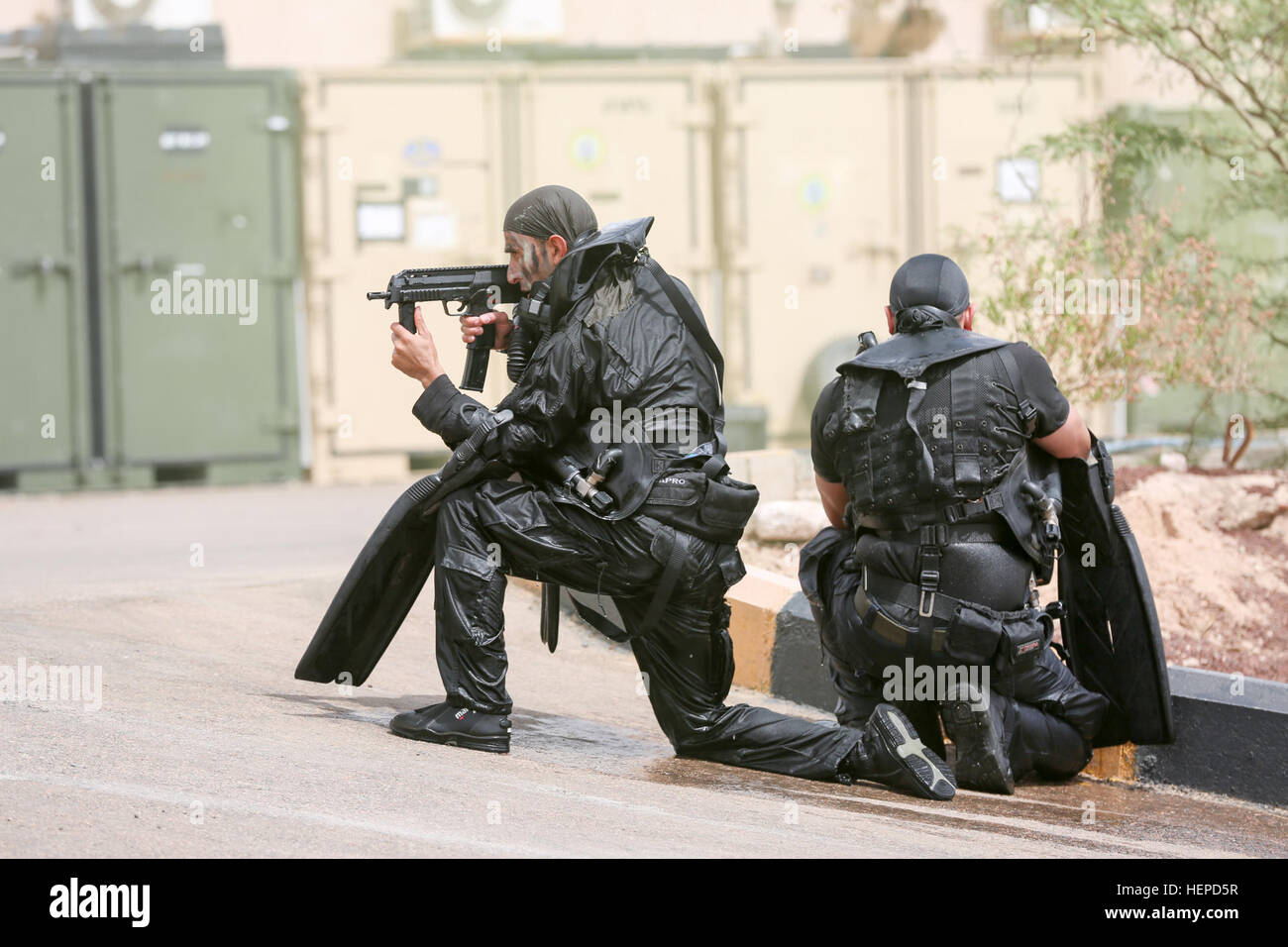Commandos from the Royal Jordanian Armed Forces take up positions after ...